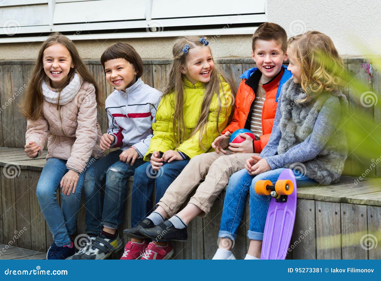 Group of Children Sitting on Bench Stock Image - Image of outdoor ...