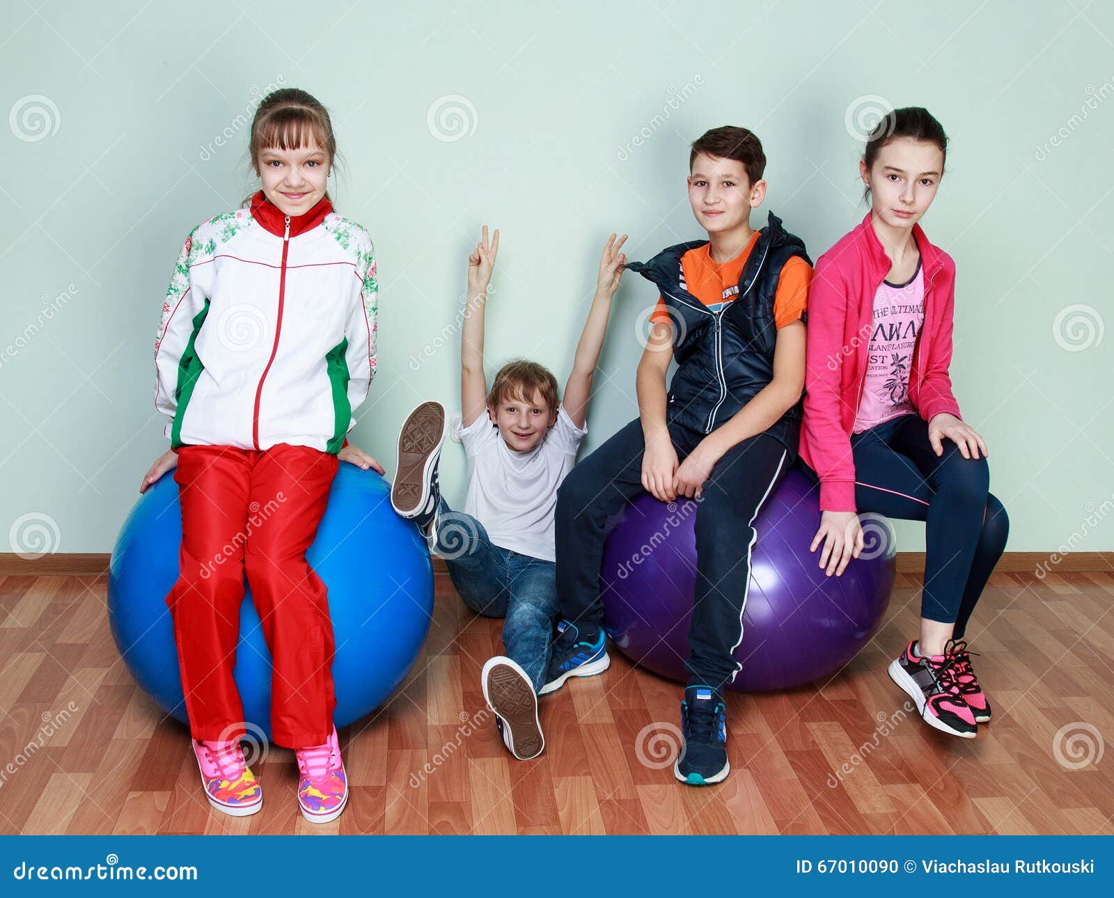 A Group of Children Sitting on the Fitballs Stock Photo - Image of ...