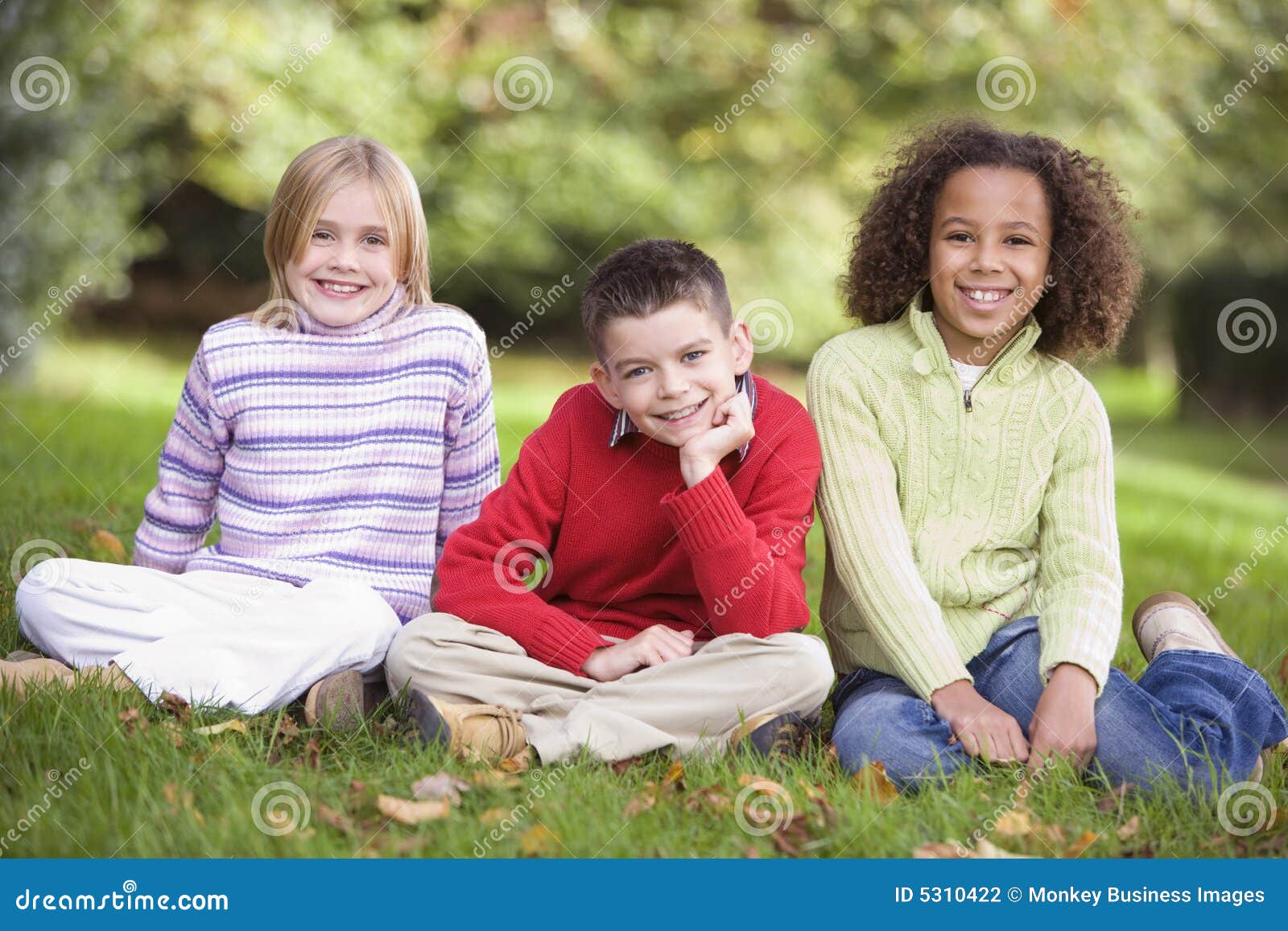 Group of Children Sitting in Garden Stock Photo - Image of caucasian ...