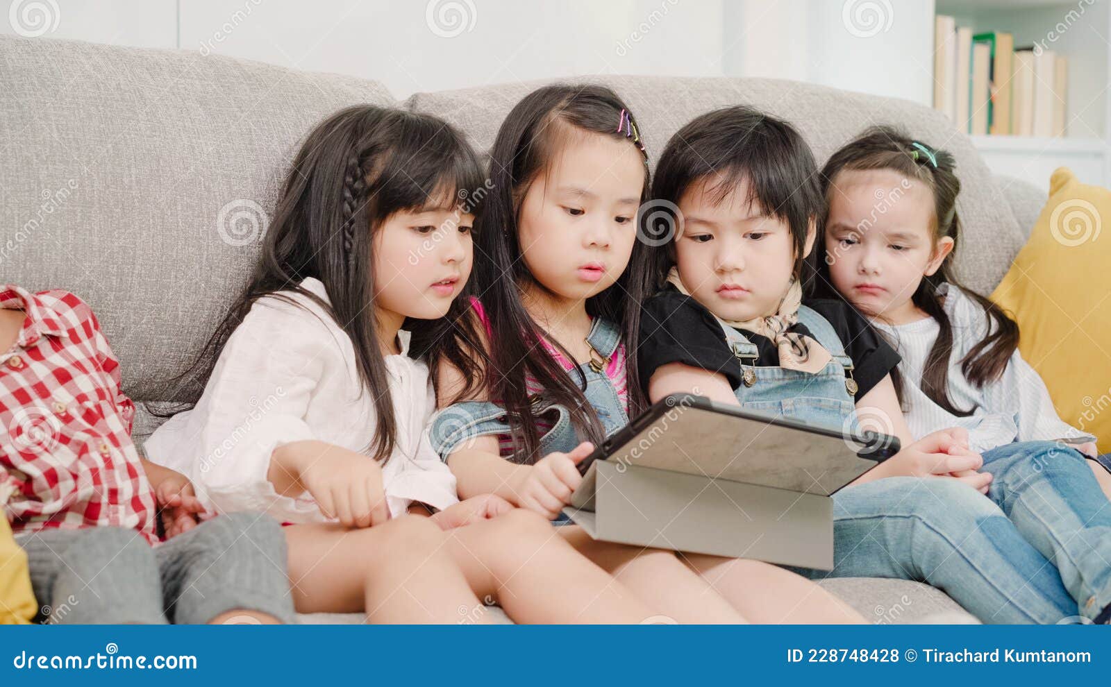 Group of Children Using Tablet in Classroom, Multi-ethnic Young Boys ...
