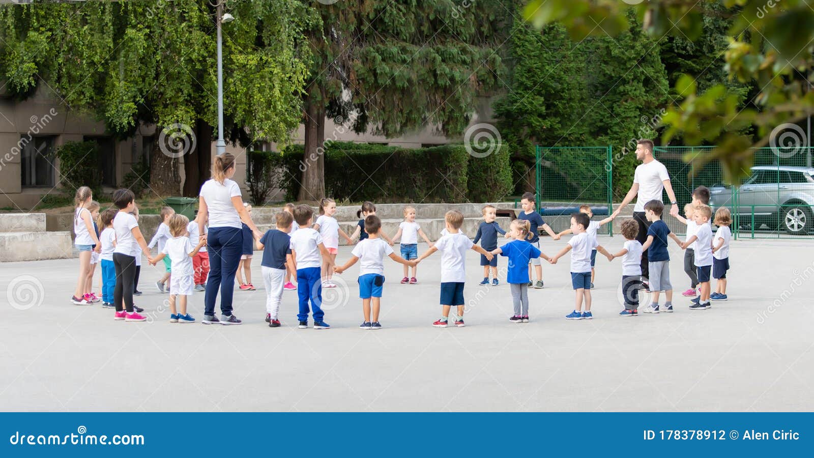 Group of Children Warming Up and Preparing for the Main Part of Lesson ...