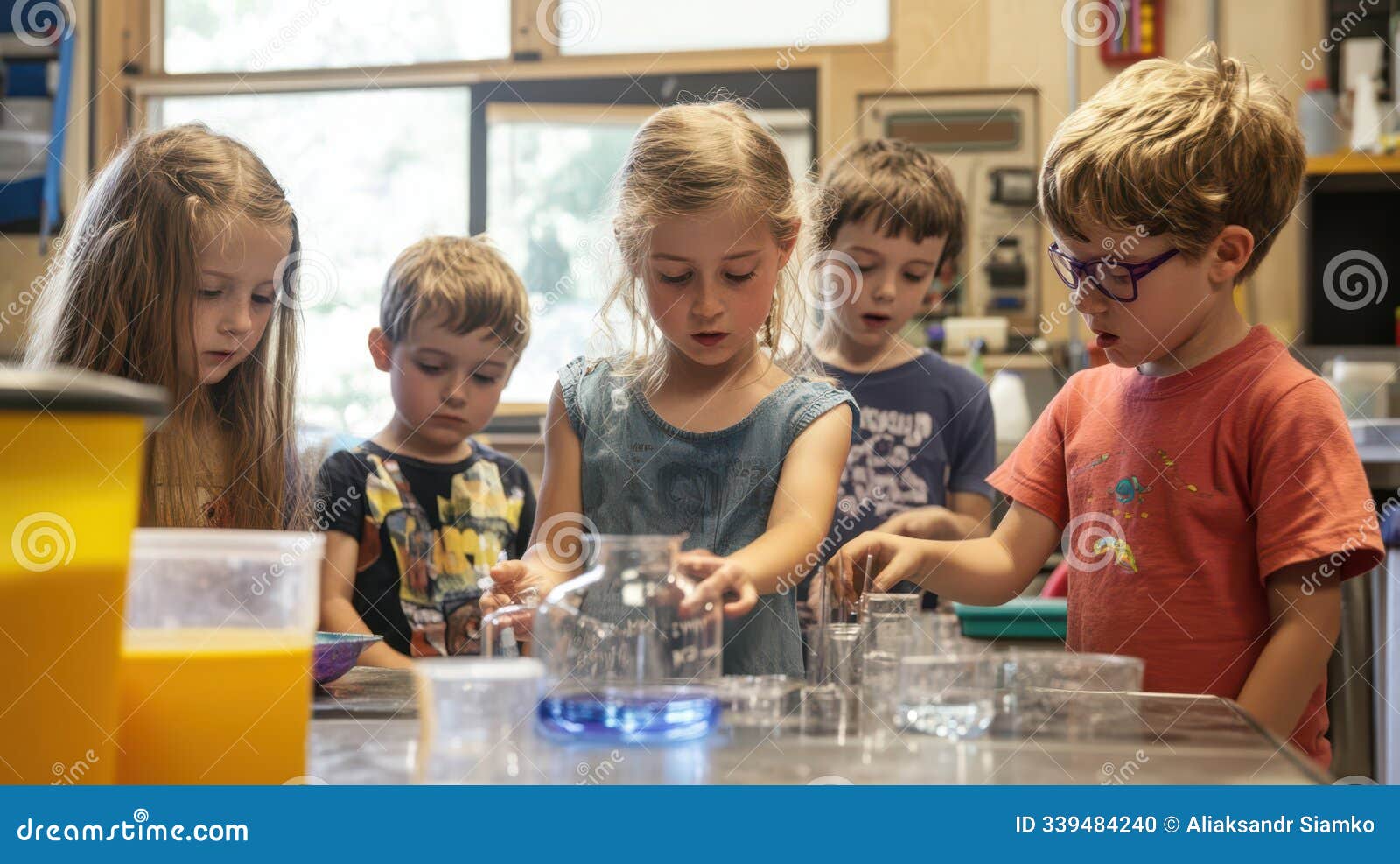 Group of Children Working on a Science Experiment during a Hands-on ...