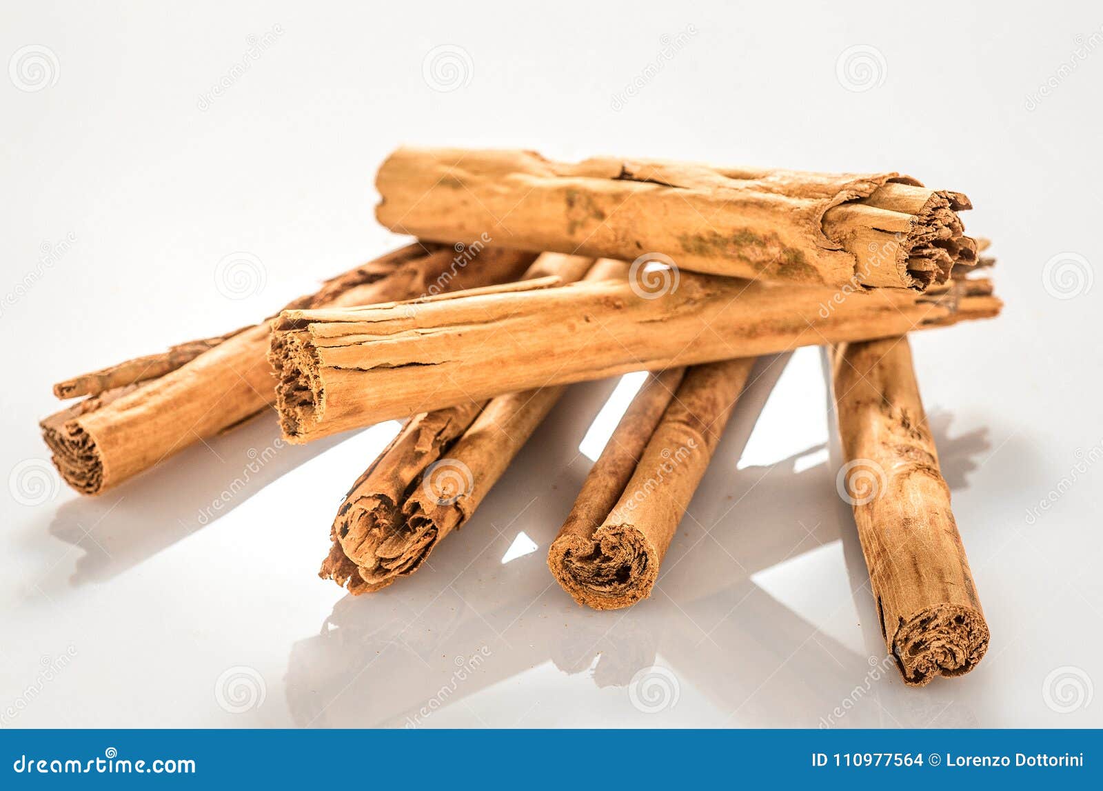 Group of Cinnamon Sticks on a White and Lucid Backround Stock Photo ...