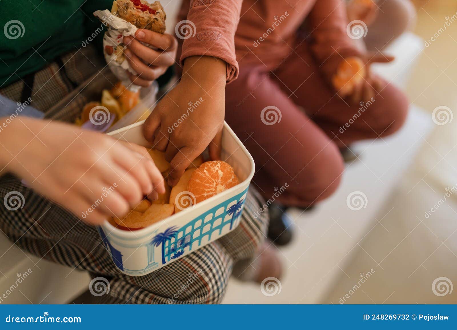 Group of Classmates Having Fruit Snack during Break at School. Stock ...