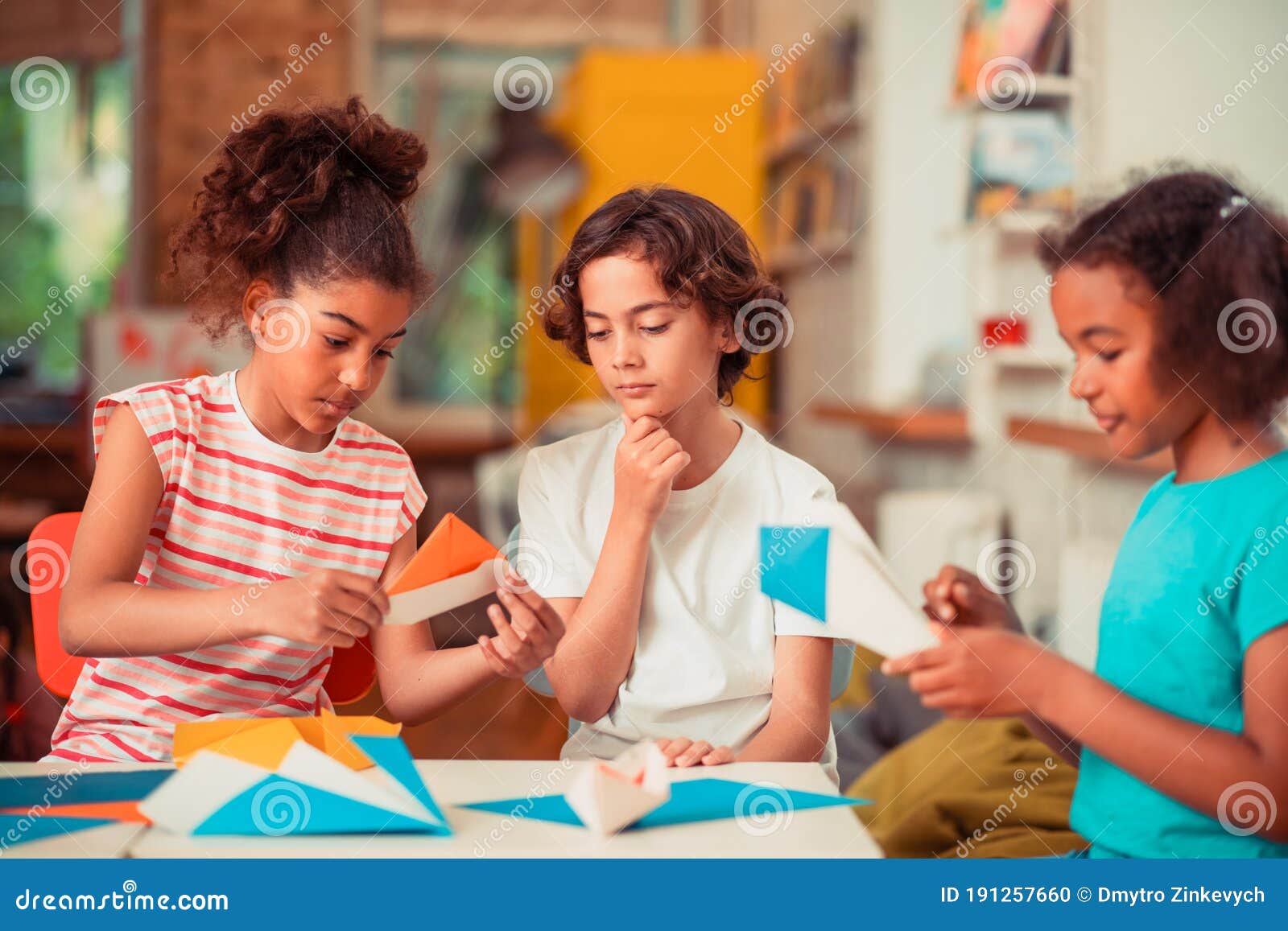 Group of Classmates Learning To Make Origami Stock Photo - Image of ...