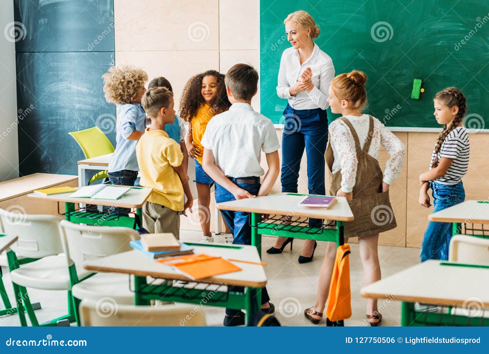 Group of Classmates Standing Around Teacher Stock Photo - Image of ...