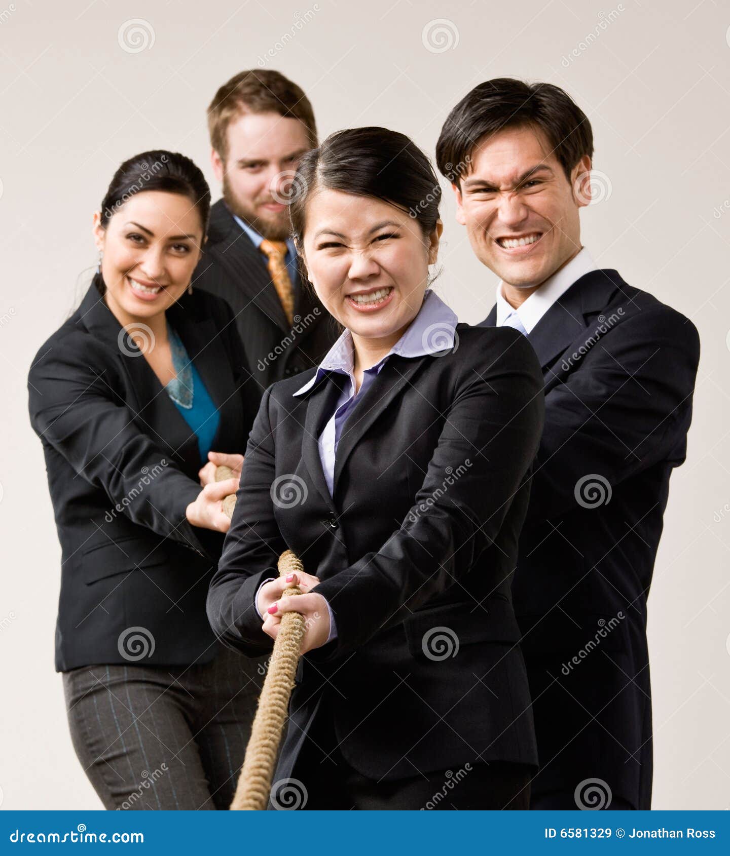Group of Co-workers Pulling Rope in Tug-of-war Stock Image - Image of ...