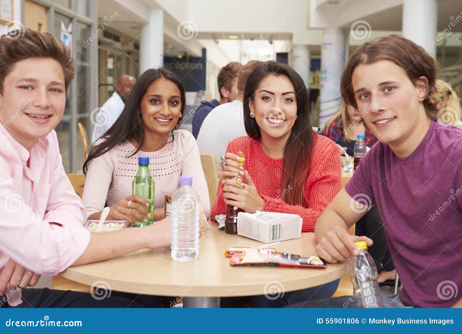 Group of College Students Eating Lunch Together Stock Photo - Image of ...