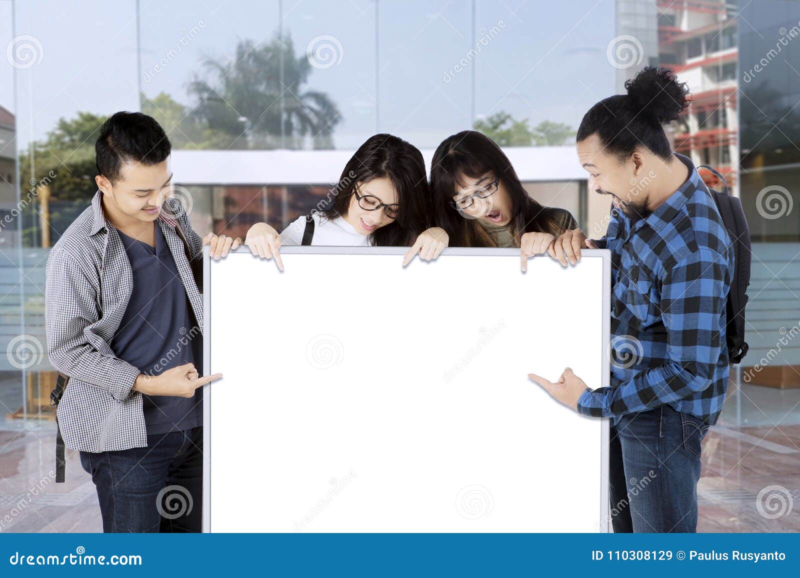 Group of College Students Pointing on White Board with Copy Space Stock ...