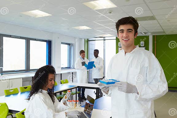 Group of College Students in Science Class with Experiment Stock Photo ...