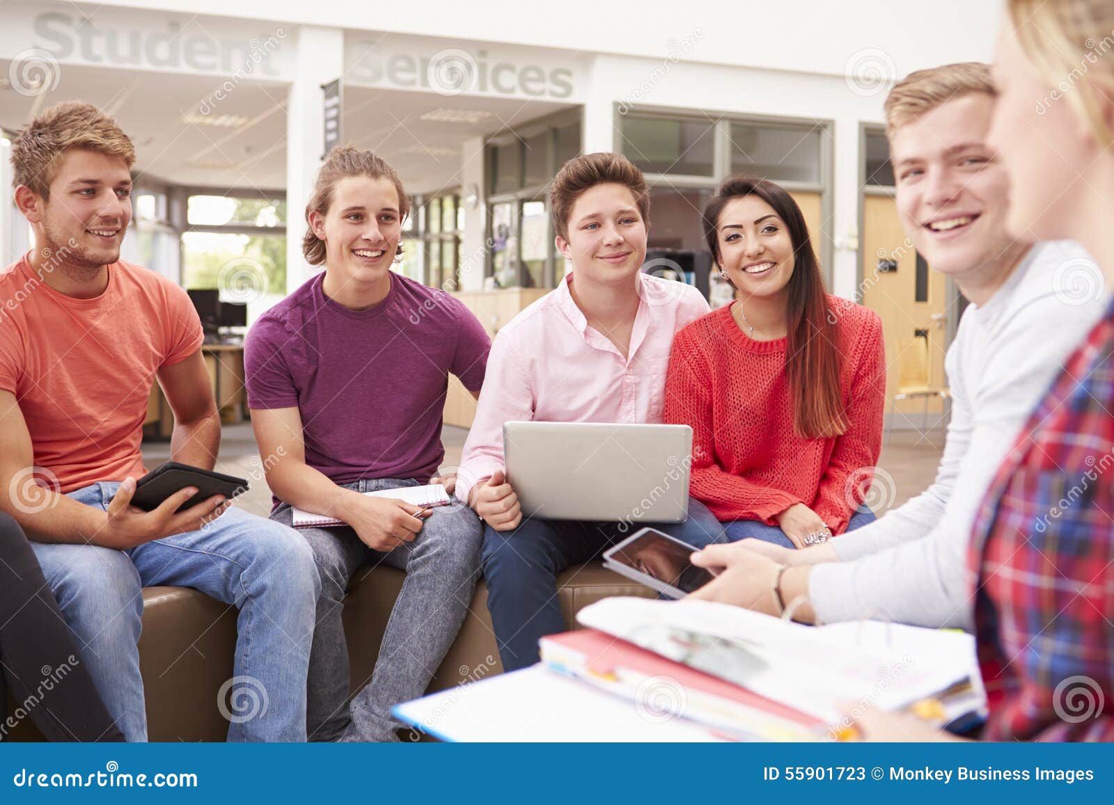 Group of College Students Sitting and Talking Together Stock Image ...