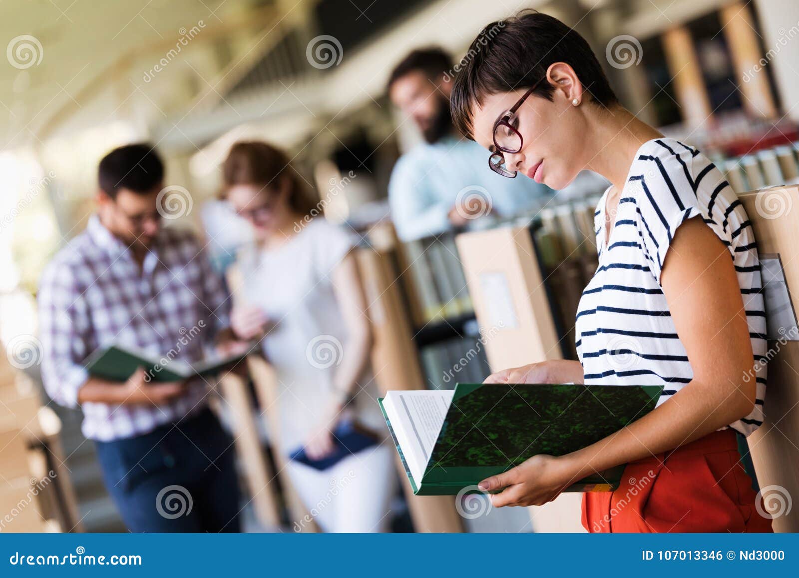Group of College Students Studying at Library Stock Photo - Image of ...