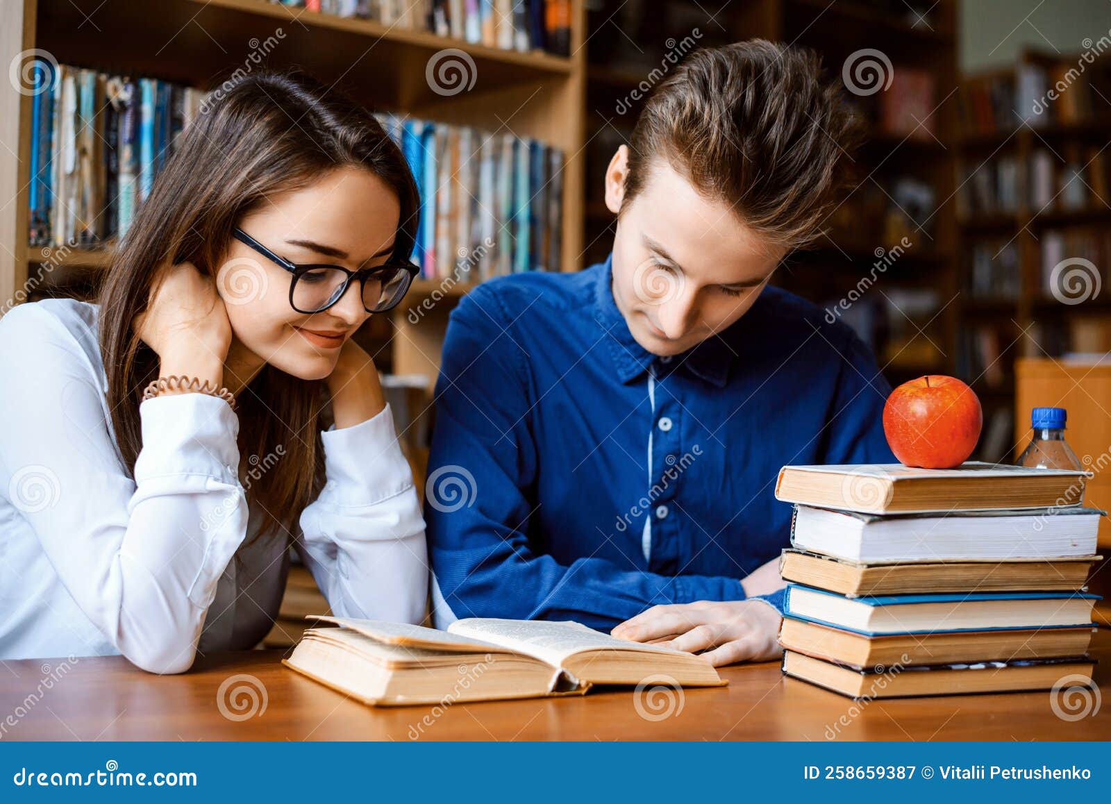 College Students Studying at the Library Stock Image - Image of female ...