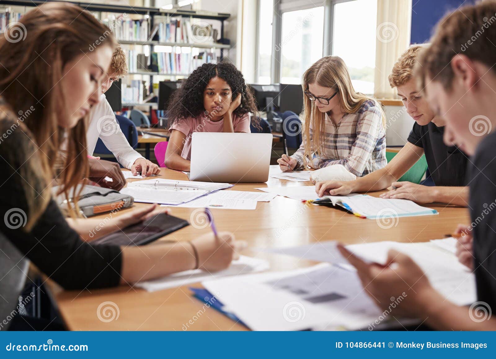 Group of College Students Working Around Table in Library Stock Image ...