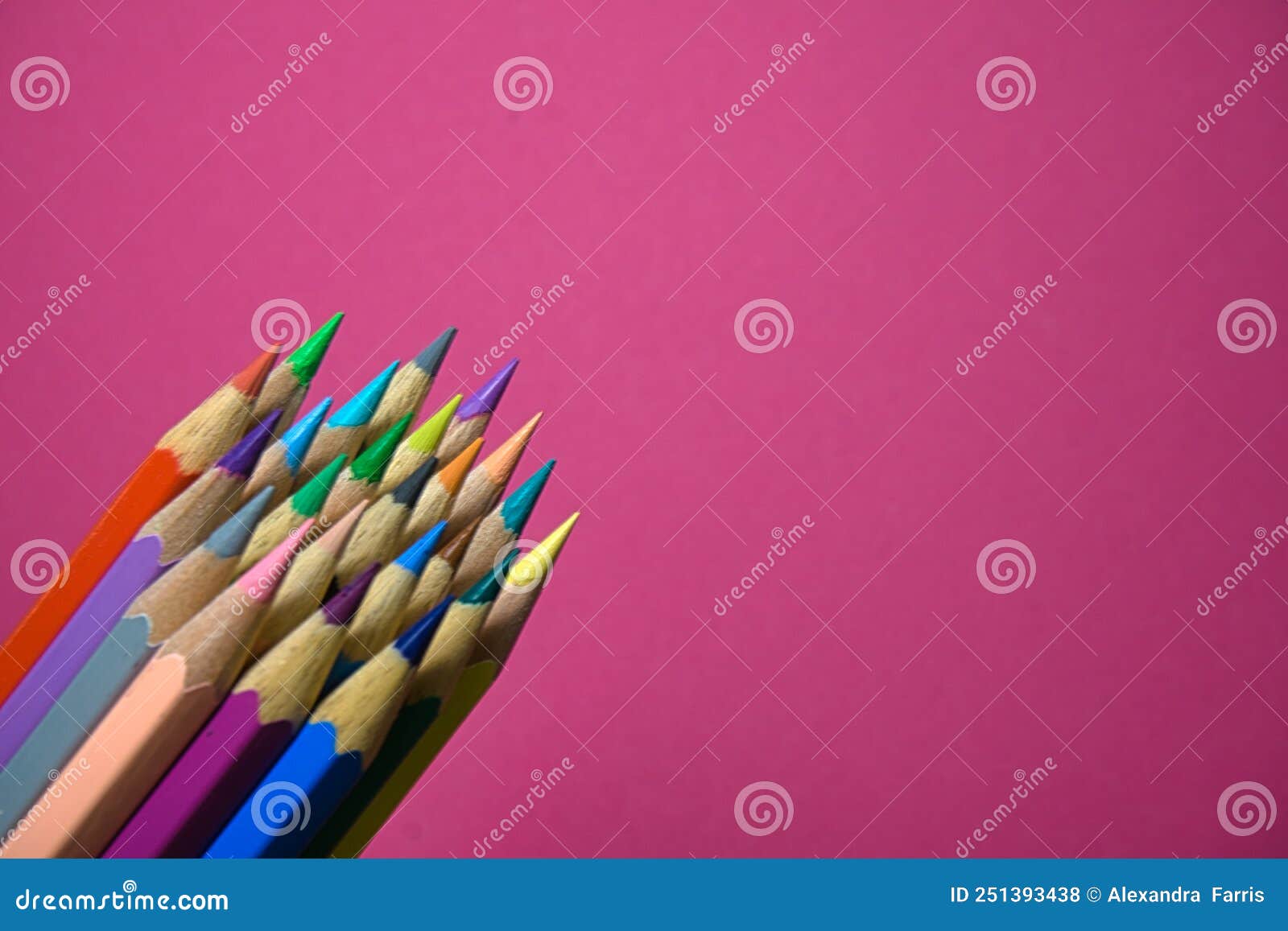 Group of Colored Pencils in the Left Bottom Corner on Pink Background ...