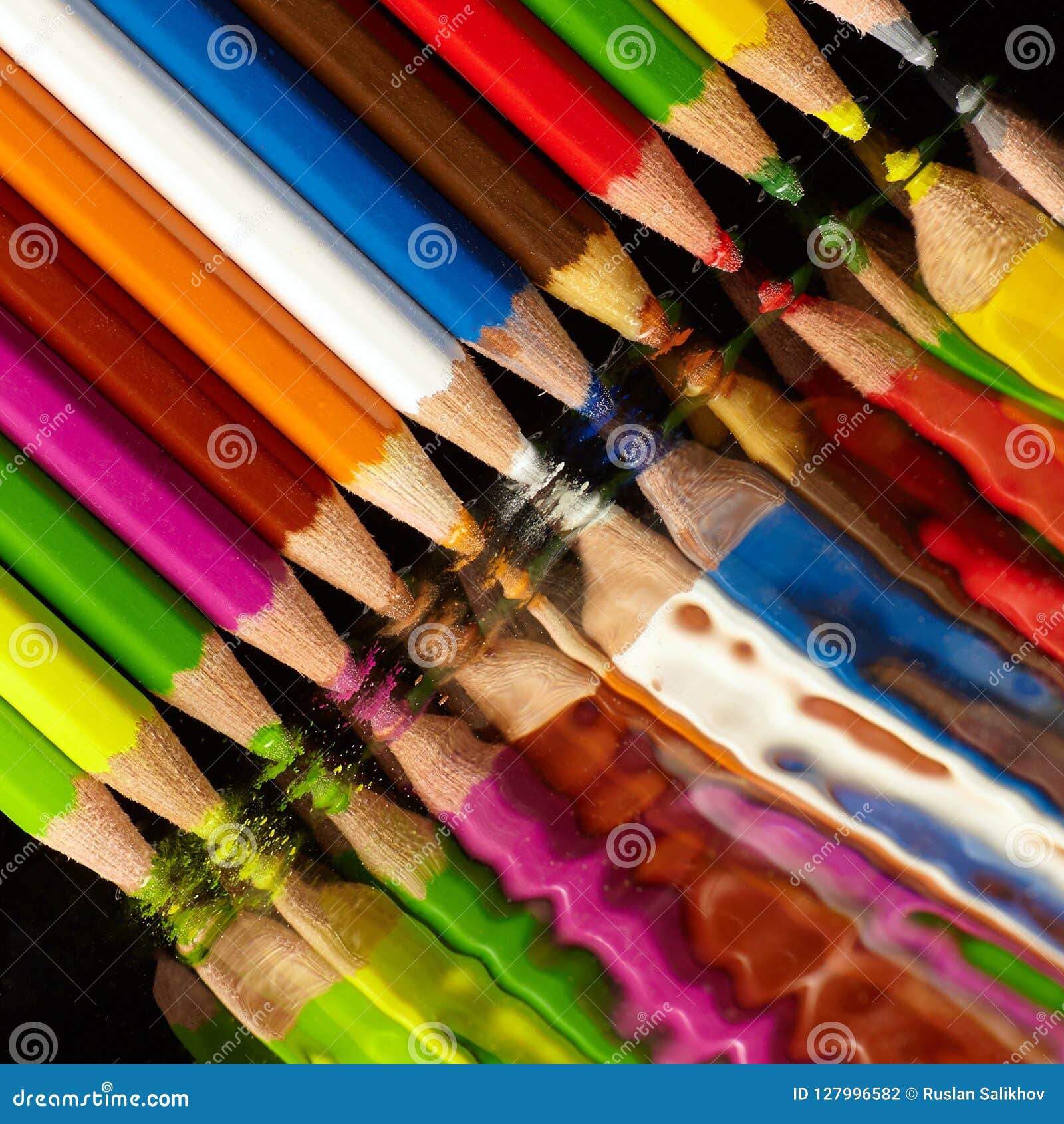 Group of Colored Pencils Reflected in the Water Stock Photo - Image of ...