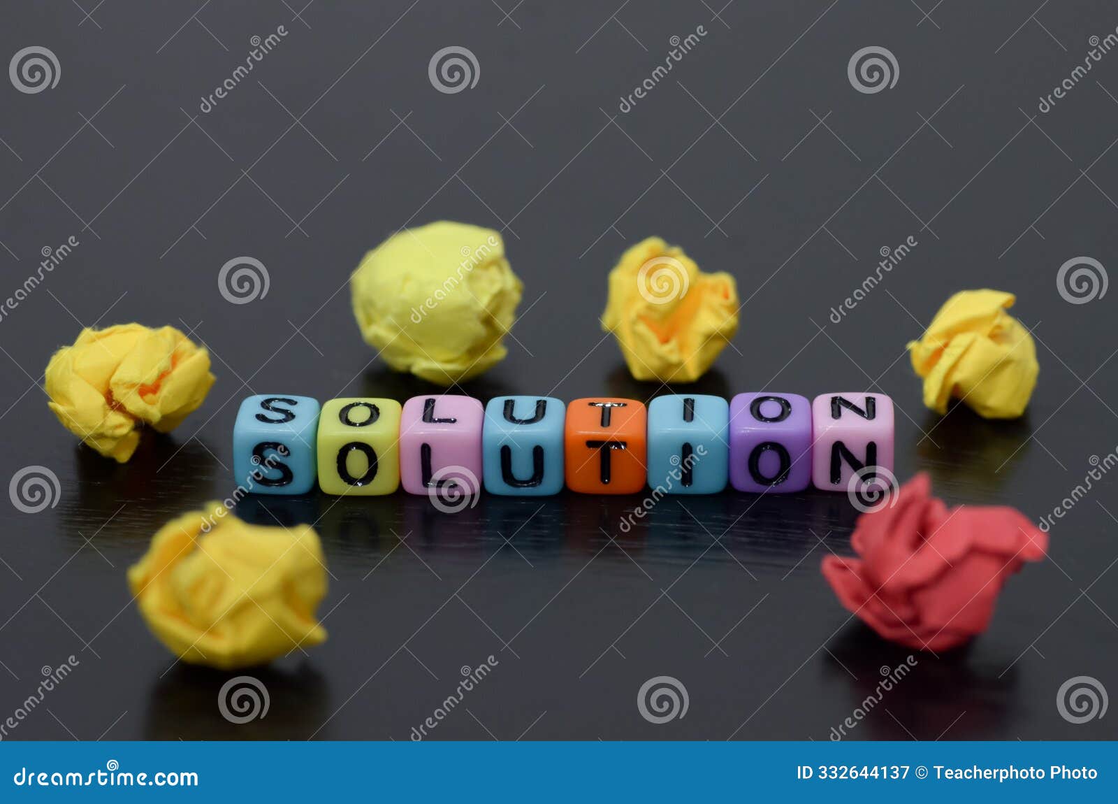 A Group of Colorful Beads Spelling Out the Word SOLUTION Surrounded by ...