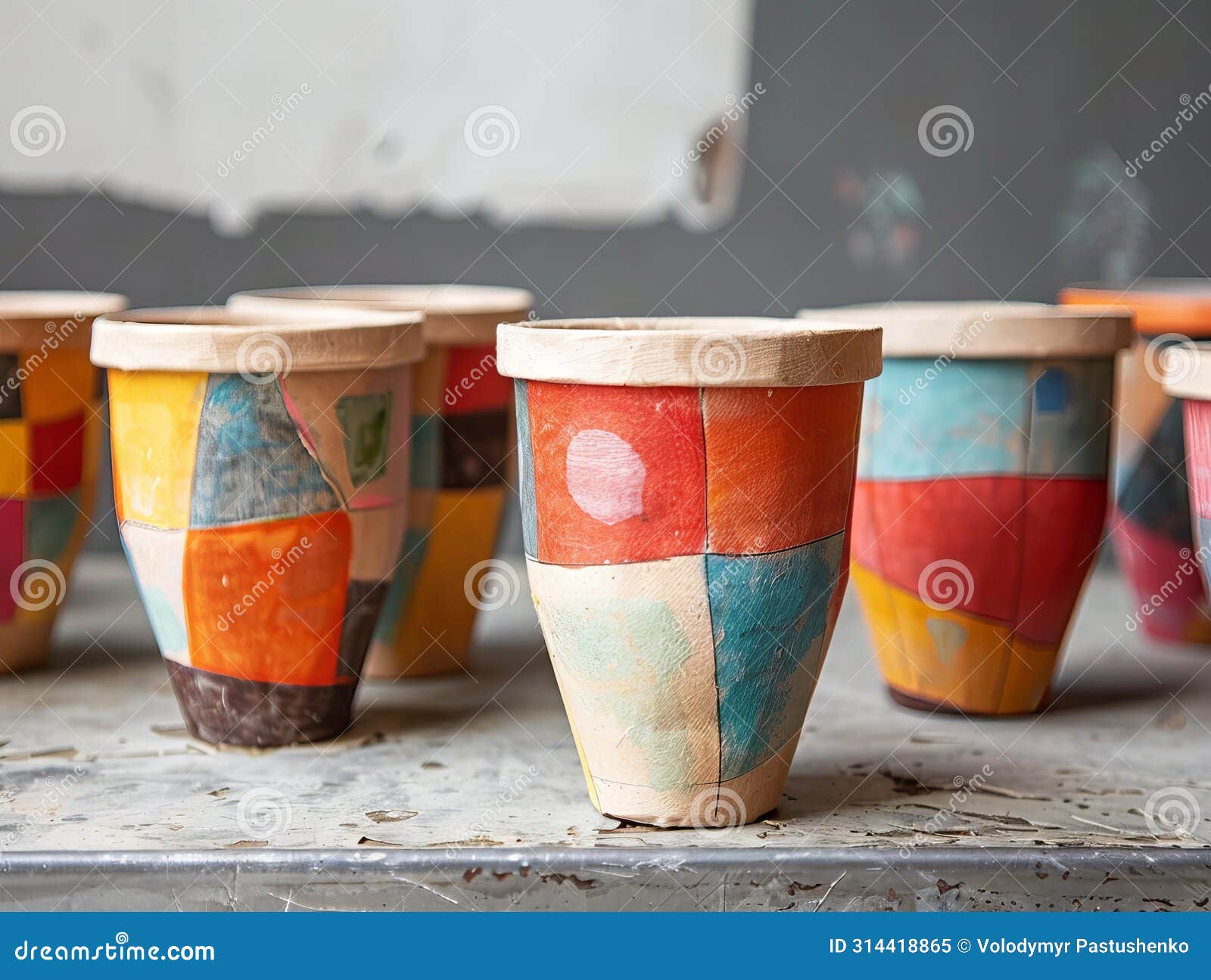 A Group of Colorful Clay Pots on a Table Stock Image - Image of paper ...