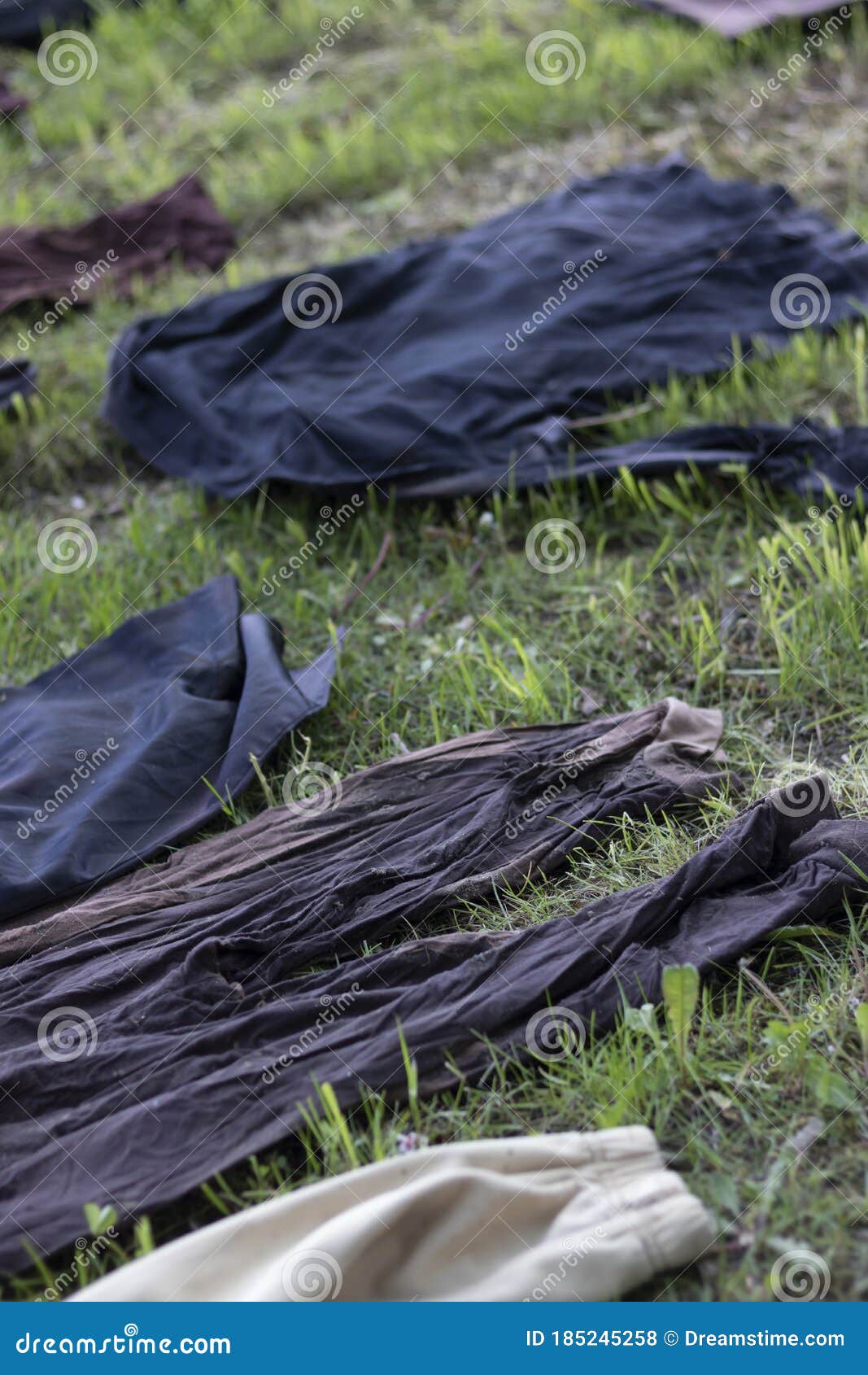A Group of Monochrome Clothes are Layed on the Grass Stock Photo ...