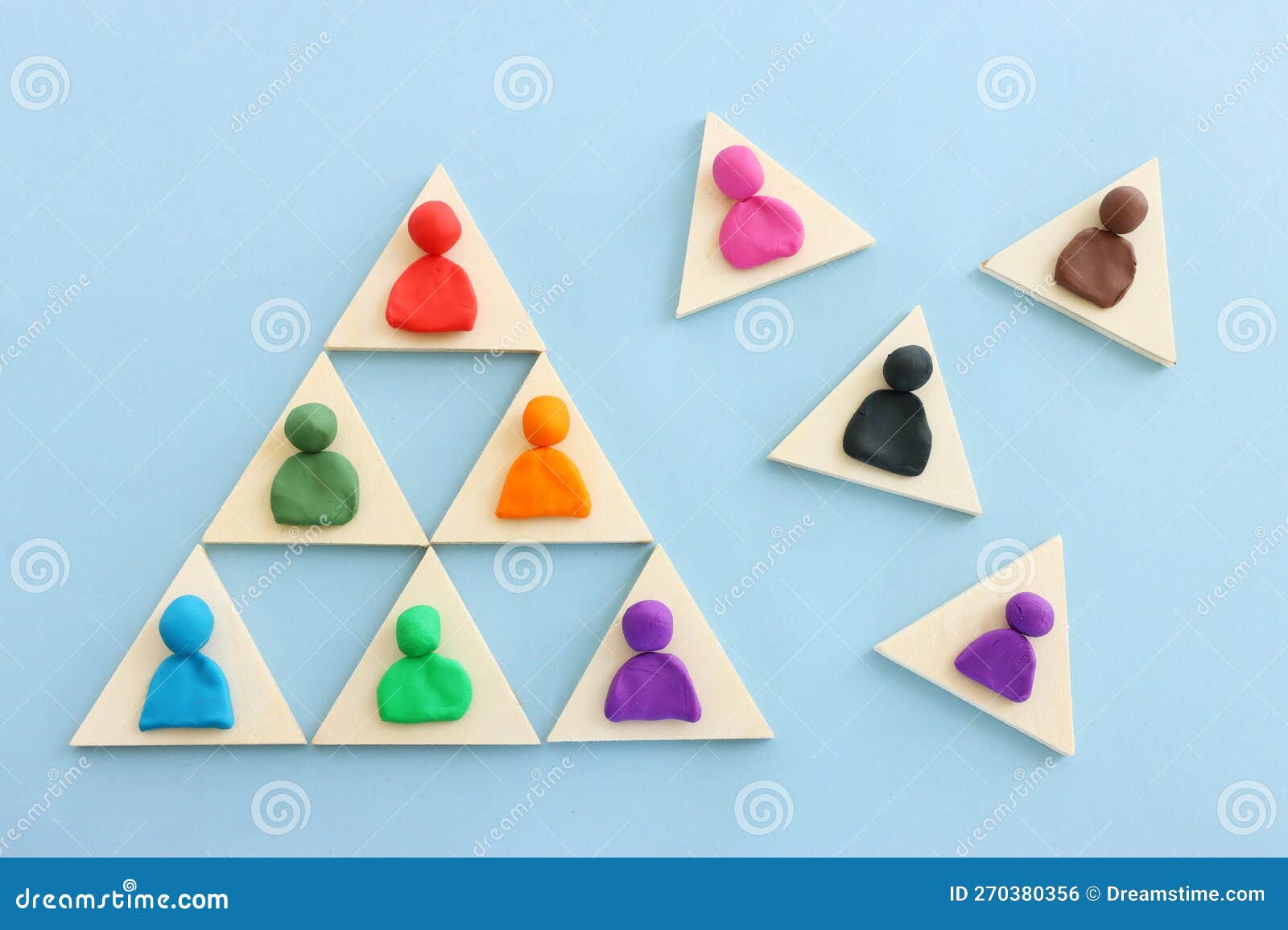 Group of Colorful Figures Over Blue Background Stock Photo - Image of ...