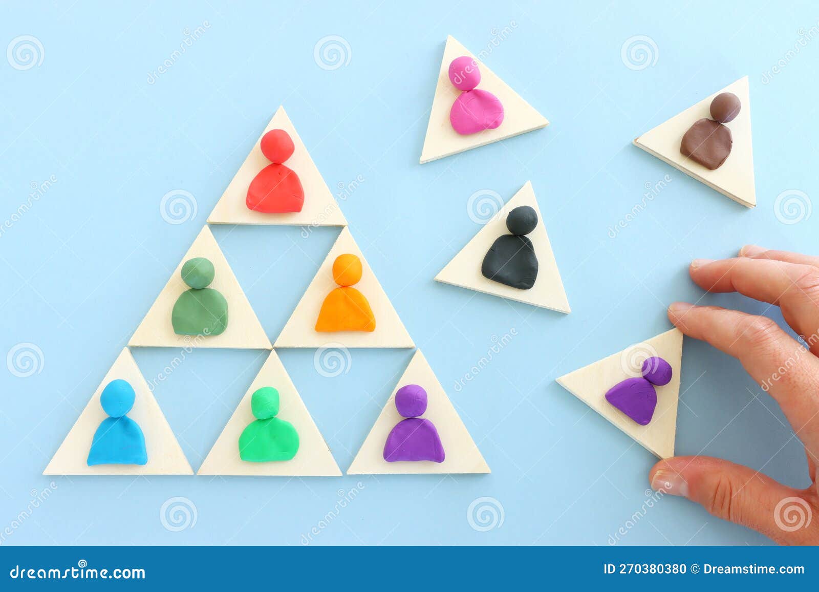 Group of Colorful Figures Over Blue Background Stock Photo - Image of ...