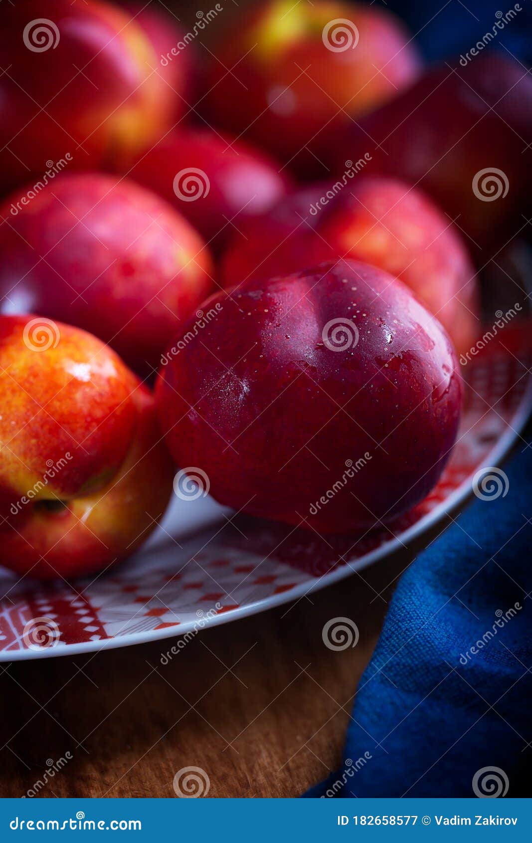 A Group of Colorful Nectarine Fruits or Peach on a Plate Stock Image ...
