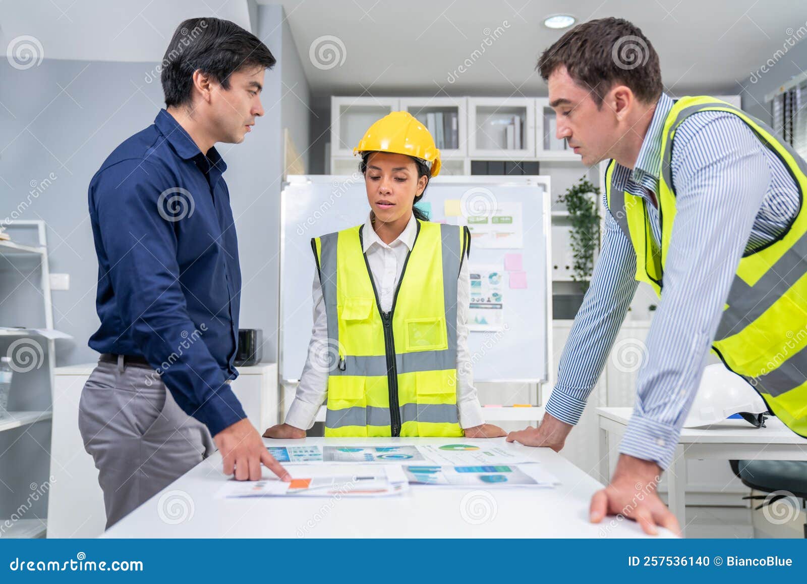A Group of Competent Engineers and Employer Discuss Plans in the Office ...