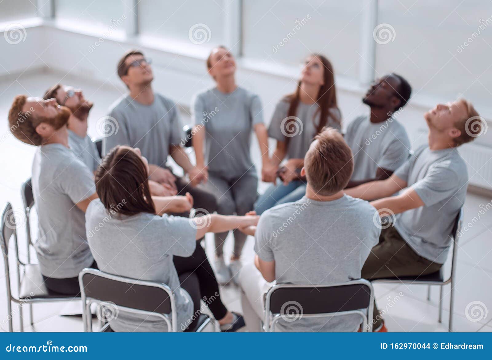 Group of Concentrated People Sitting in a Circle. Stock Photo - Image ...