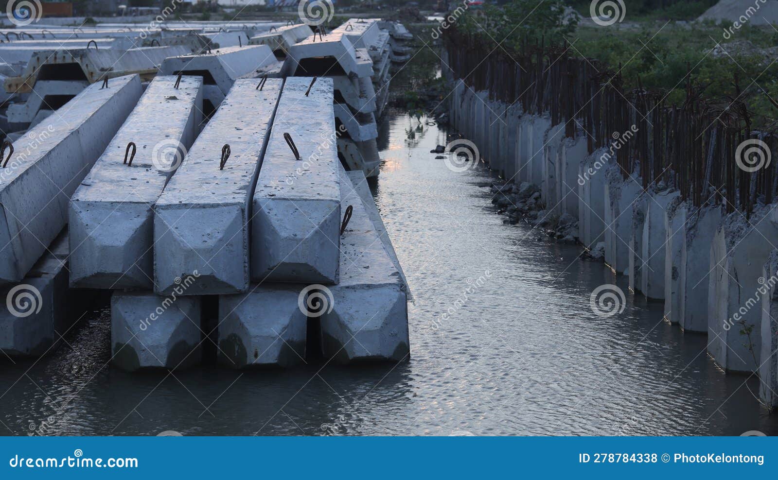 A Group of Concrete Blocks are on the Water Stock Photo - Image of ...