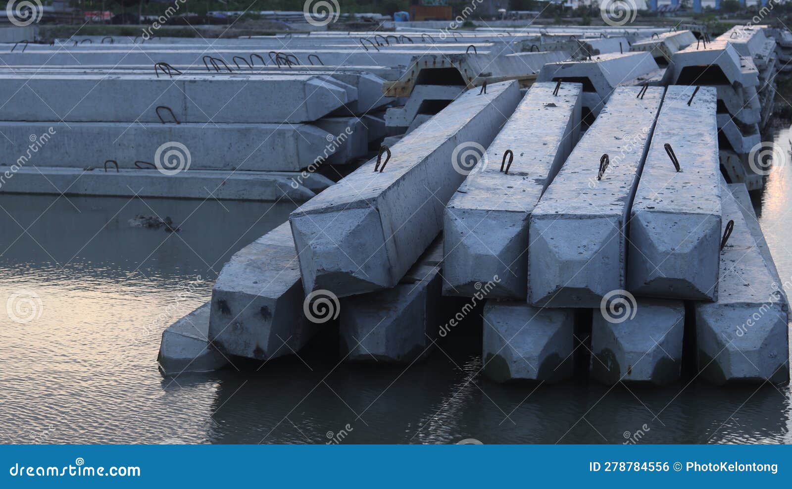 A Group of Concrete Blocks are on the Water Stock Photo - Image of roof ...