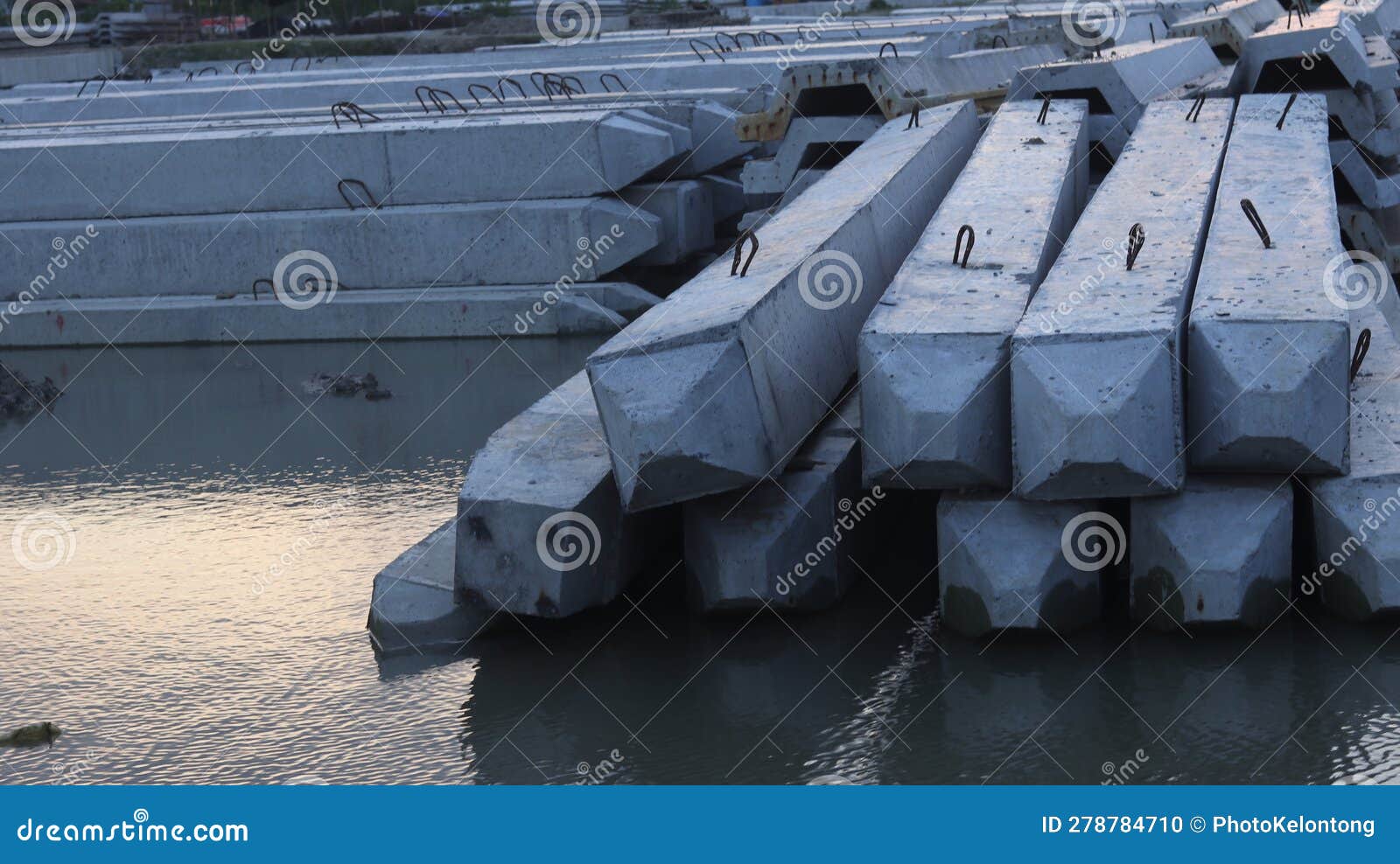 A Group of Concrete Blocks are on the Water Stock Photo - Image of ...