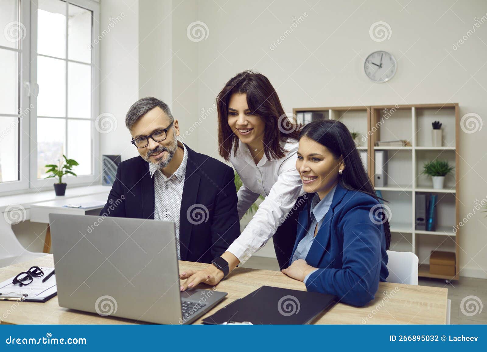 Group of Confident Business People Analyzing Data Using Laptop Stock ... Group of Confident Business People Analyzing Data Using Laptop Stock ...