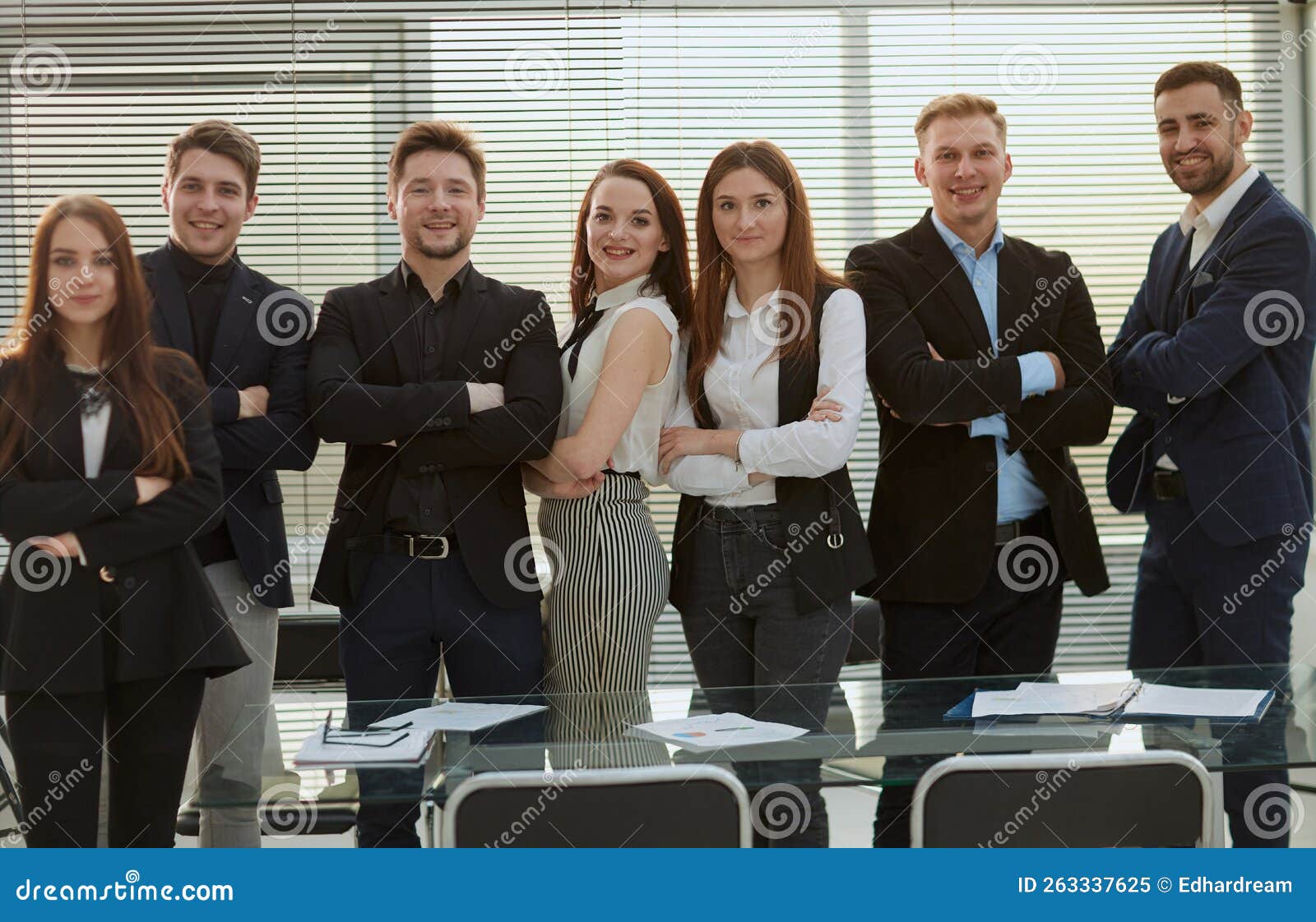Group of Confident Young Employees Standing in the Office. Stock Image ...