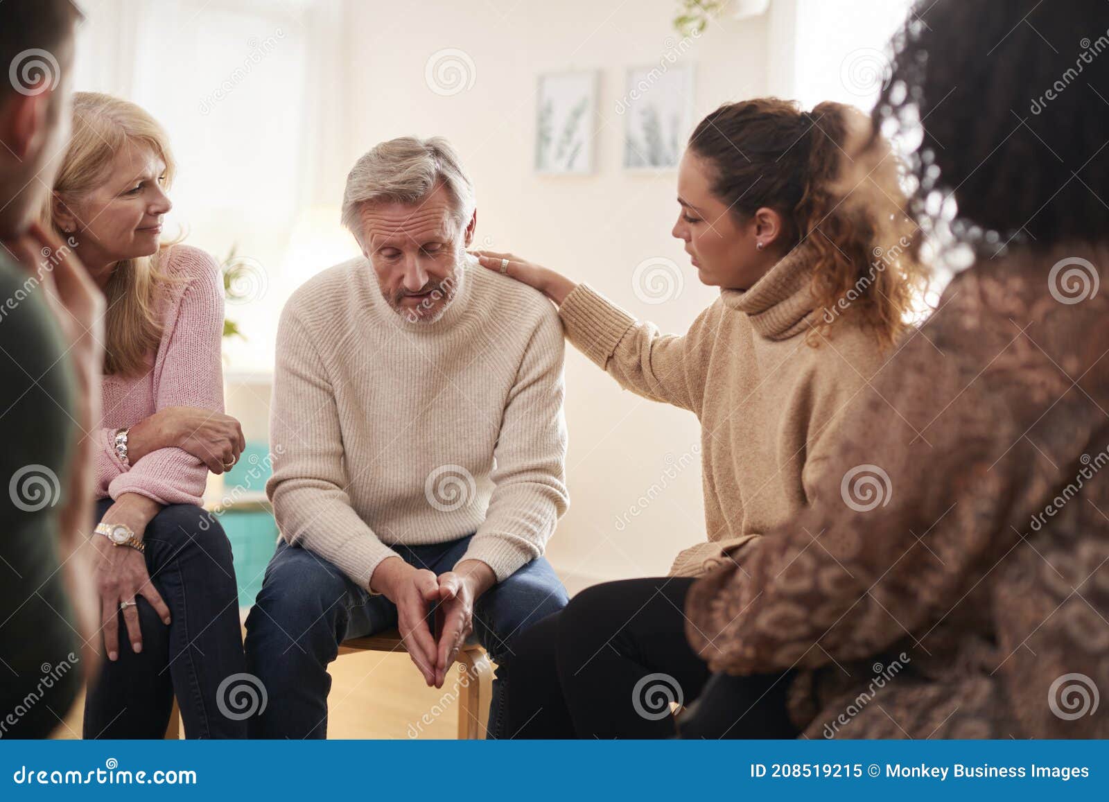 Group Consoling Man Speaking at Support Group Meeting for Mental Health ...