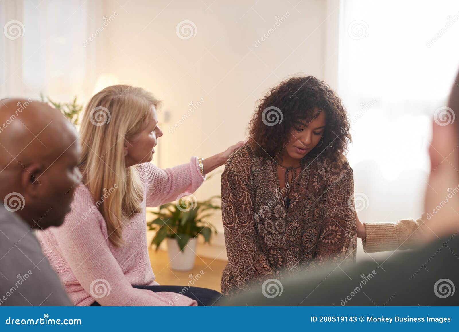 Group Consoling Woman Speaking at Support Group Meeting for Mental ...