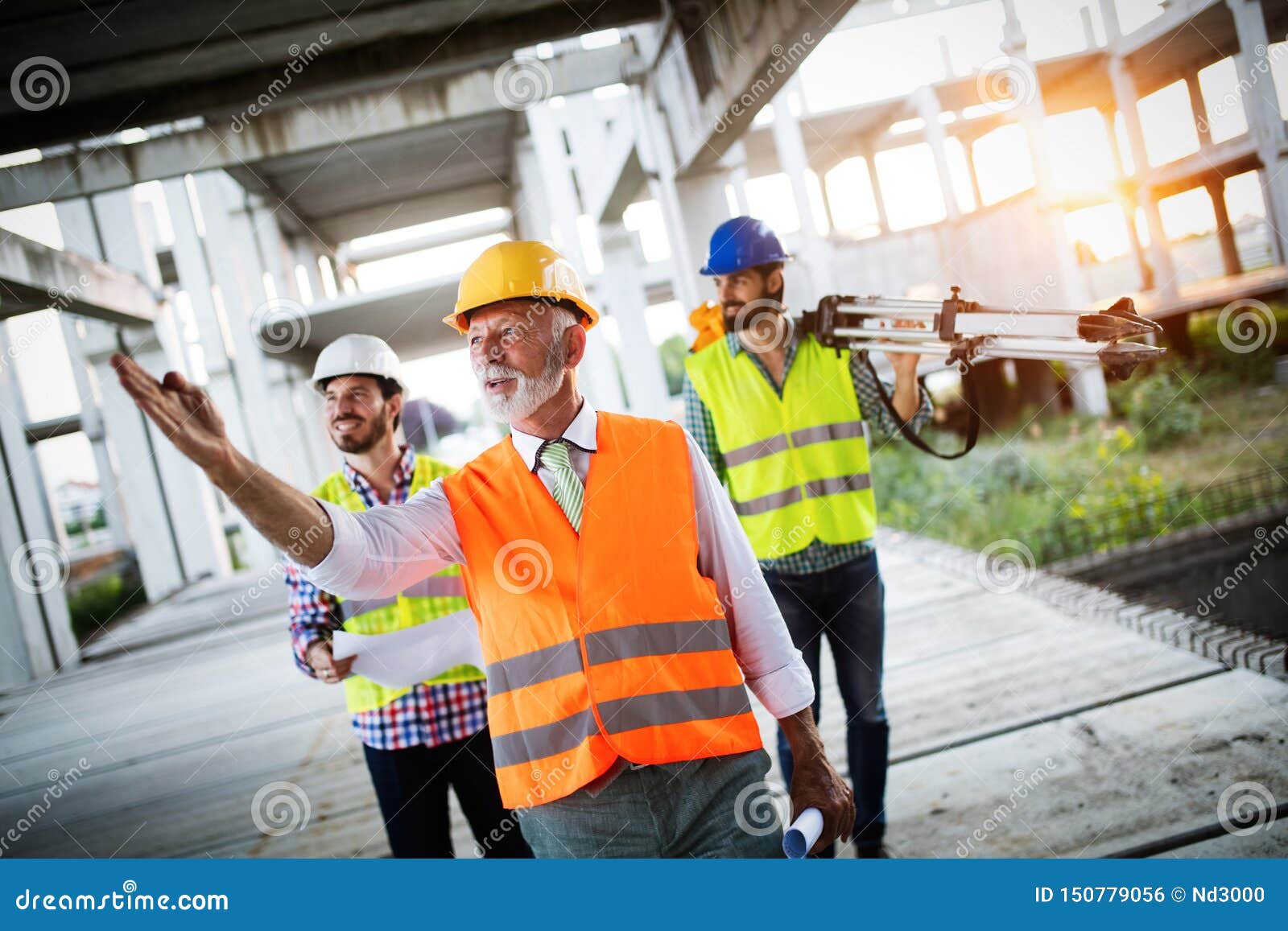 Group of Construction Engineer Working in Construction Site Stock Photo ...
