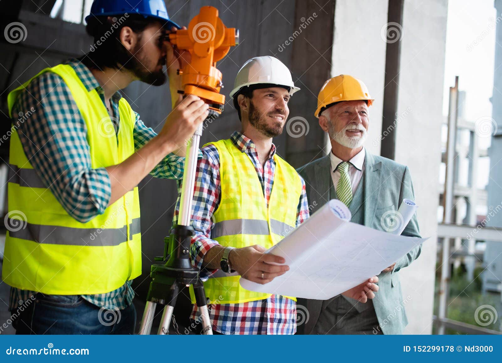 Group of Construction Engineer Working in Construction Site Stock Photo ...
