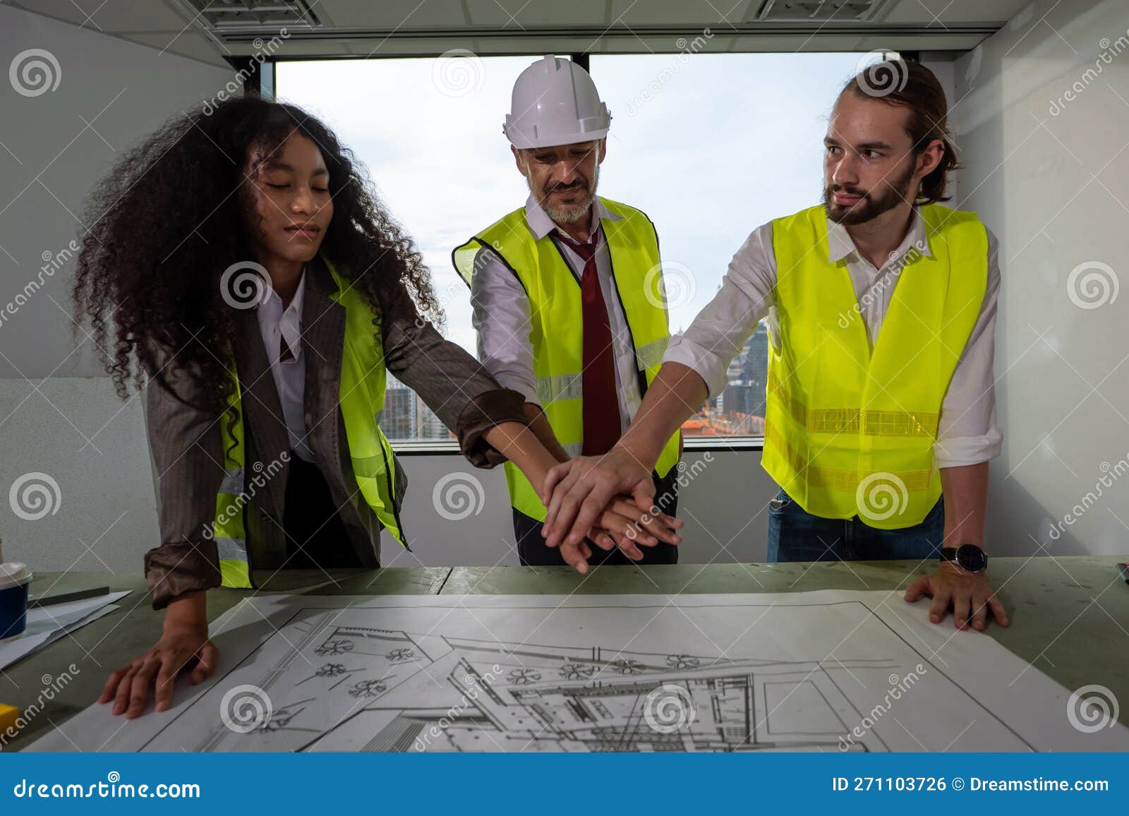 Group of Construction Engineers Touching and Stacking Hands Supporting ...