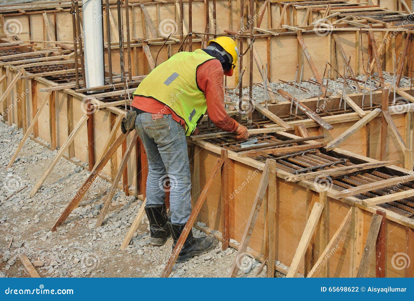 Group of Construction Workers Fabricating Ground Beam Formwork ...