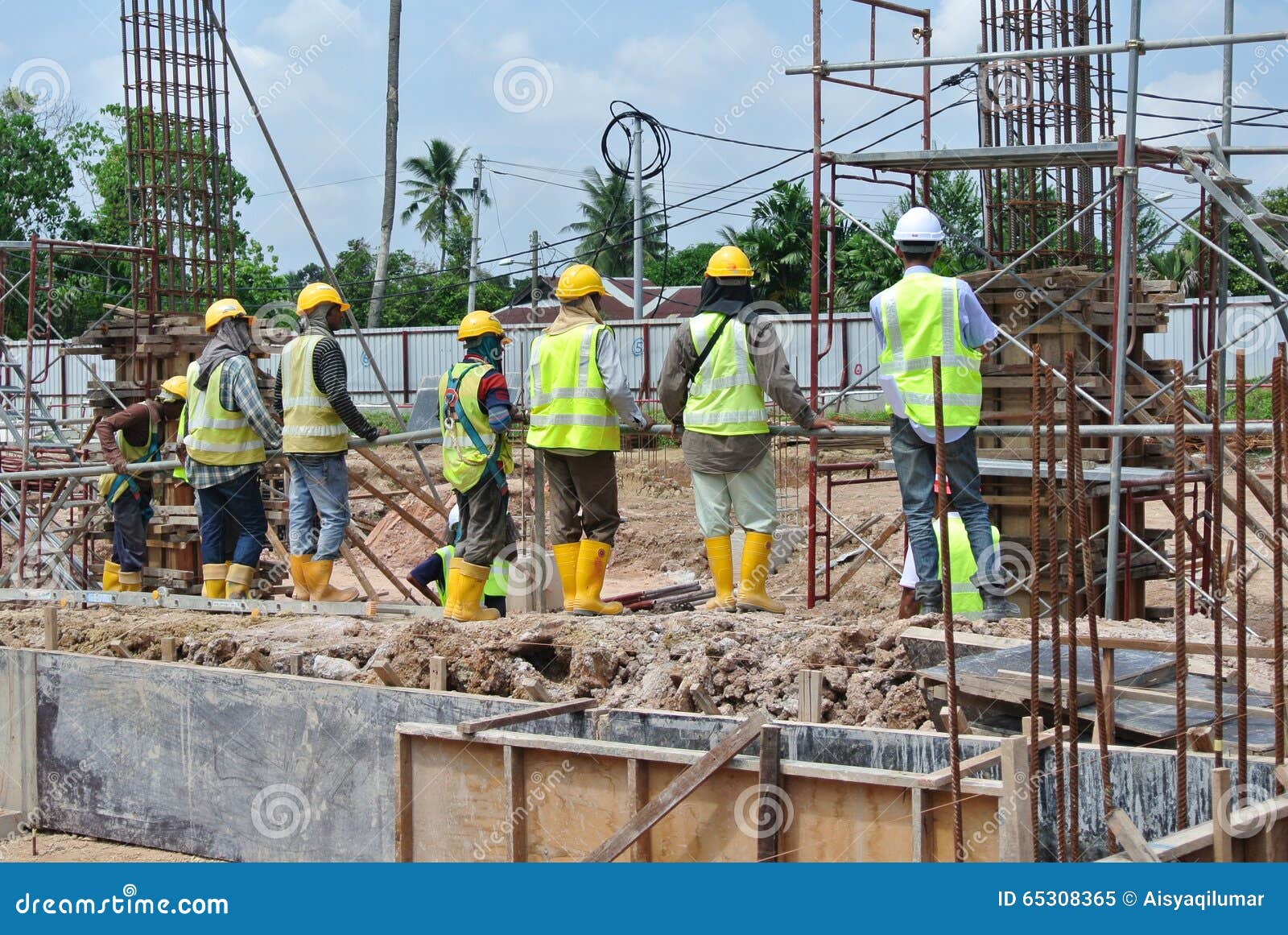 Group of Construction Workers Standing at the Construction Site ...