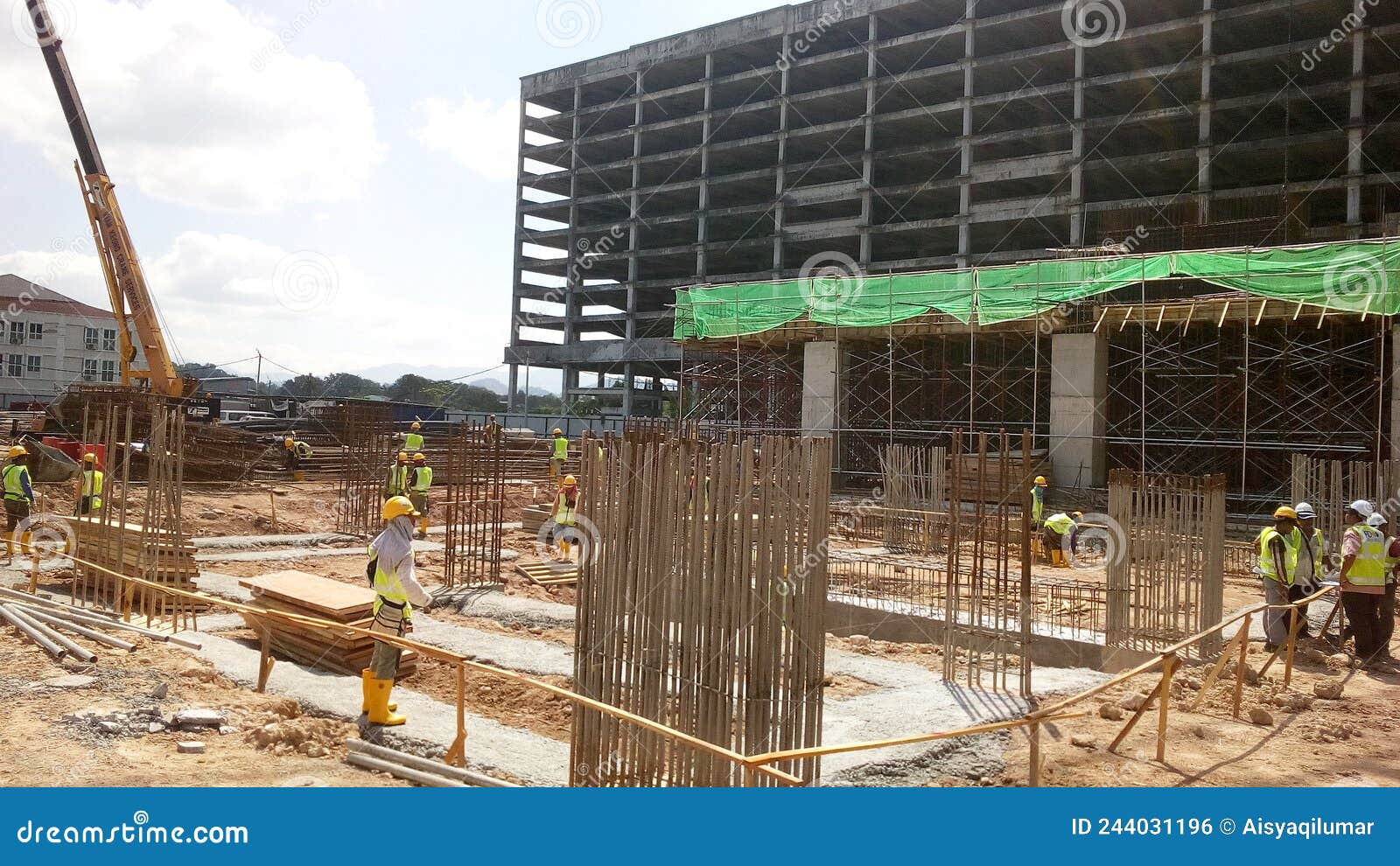 Group of Construction Workers Working at the Construction Site. the ...