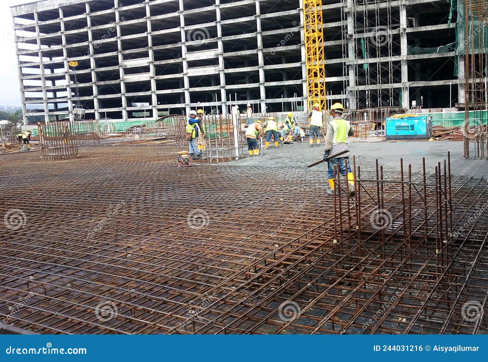 Group of Construction Workers Working at the Construction Site. the ...