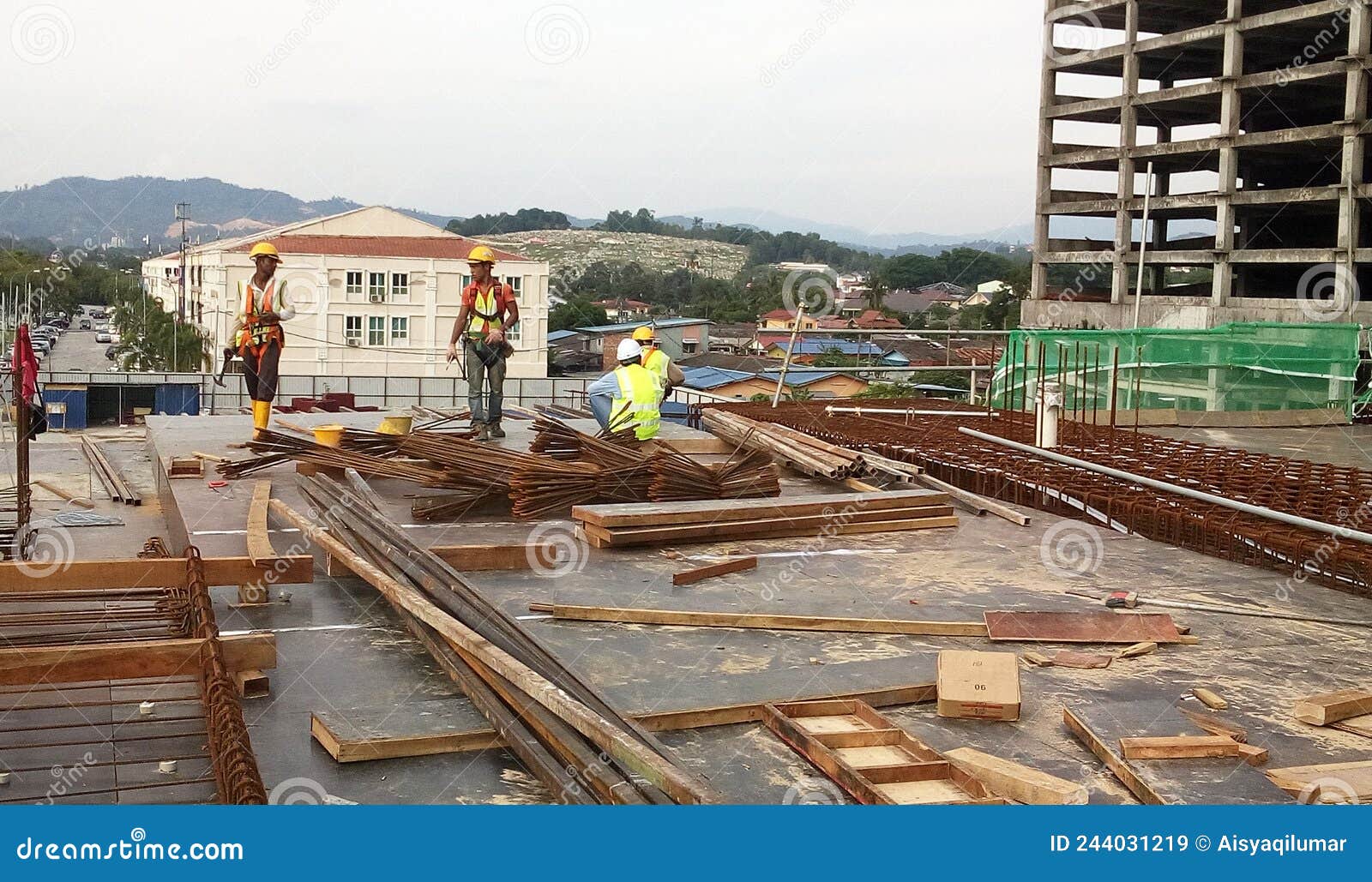 Group of Construction Workers Working at the Construction Site. the ...