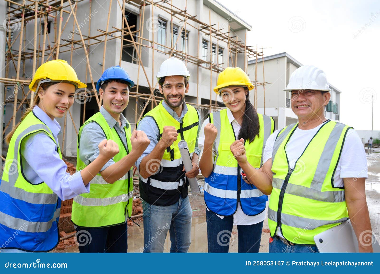 Group of Contractors, Engineers and Formats in Safety Vests with ...