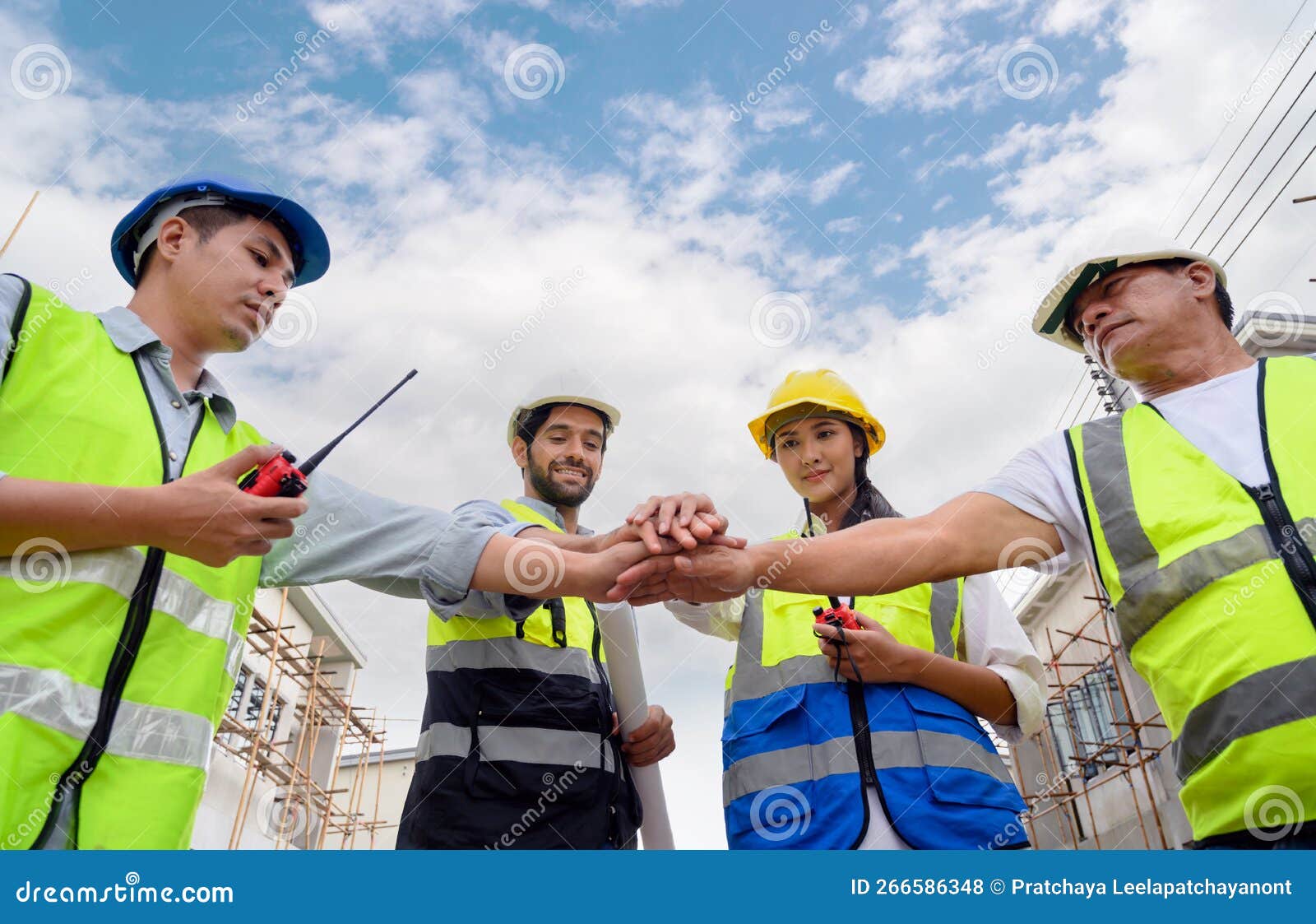 Group of Contractors, Engineers and Formats in Safety Vests with ...
