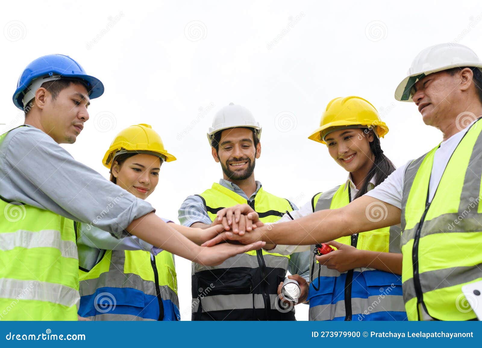 Group of Contractors, Engineers and Formats in Safety Vests with ...