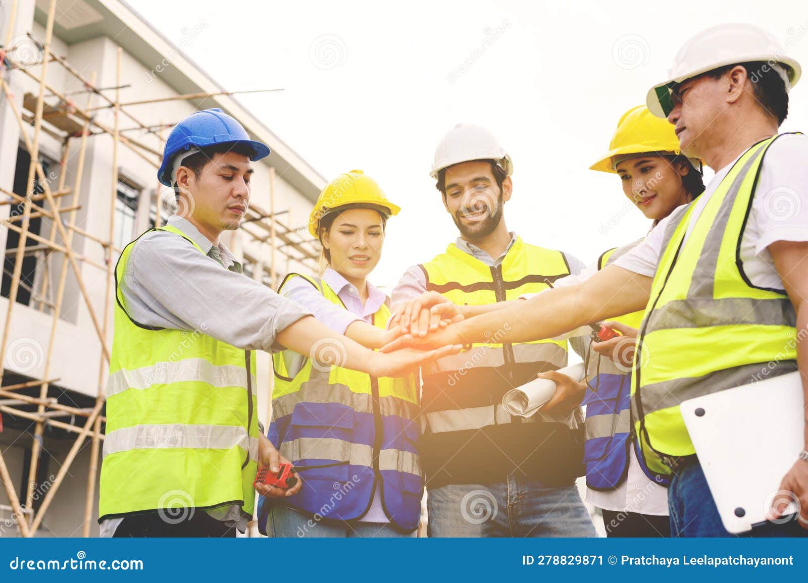 Group of Contractors, Engineers and Formats in Safety Vests with ...
