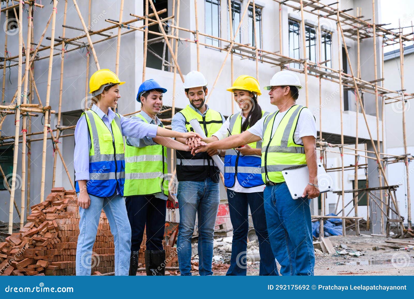 Group of Contractors, Engineers and Formats in Safety Vests with ...