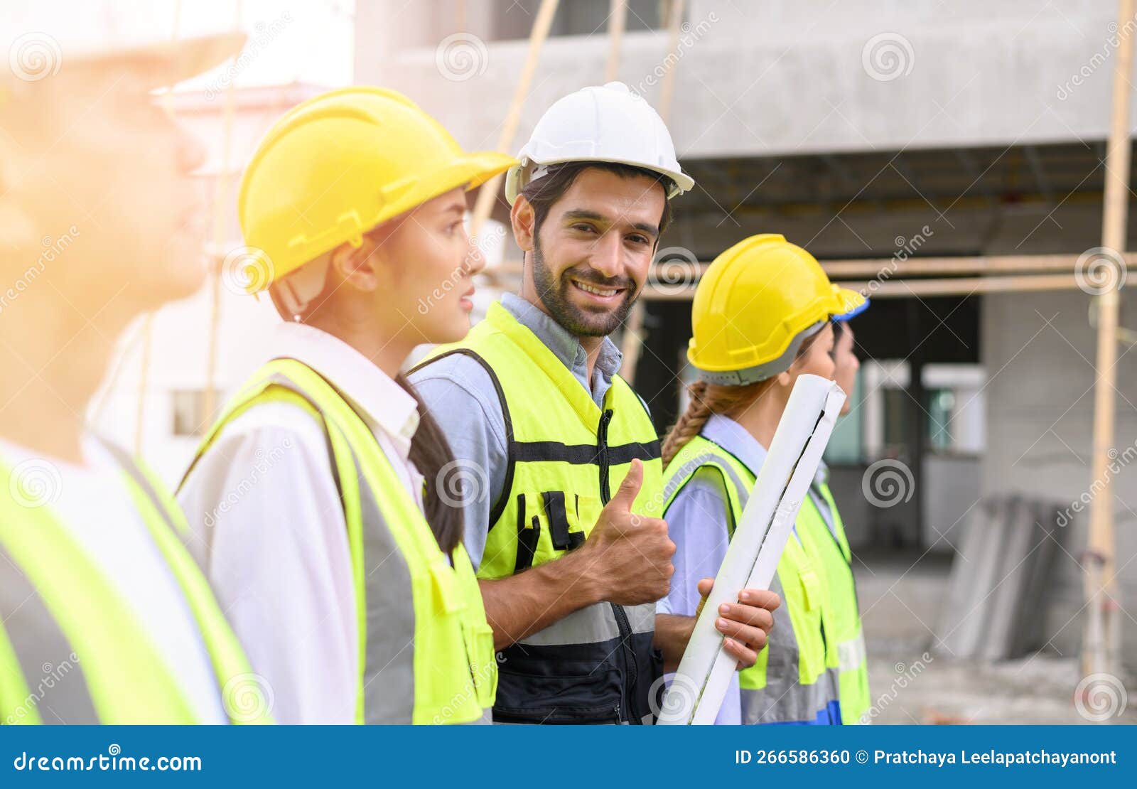 Group of Contractors, Engineers and Formats in Safety Vests with ...