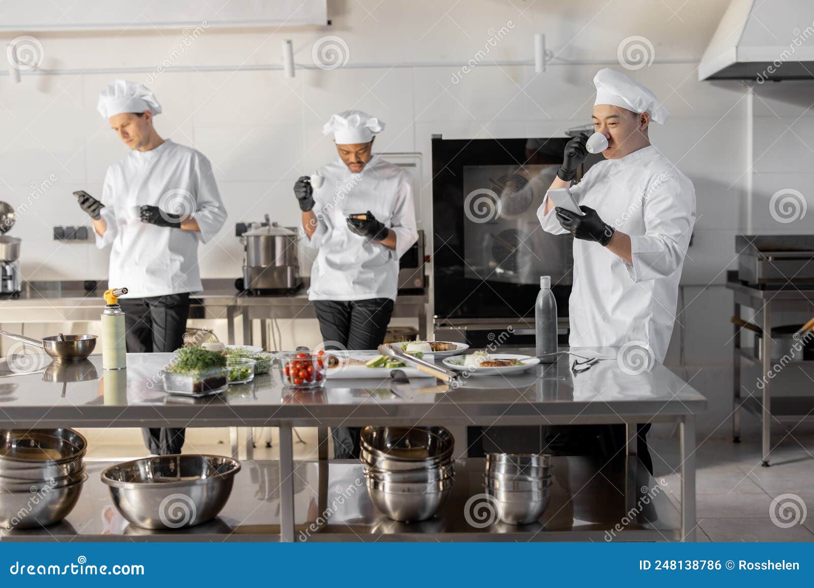 Group of Cooks during a Coffee Break in the Restaurant Kitchen Stock ...